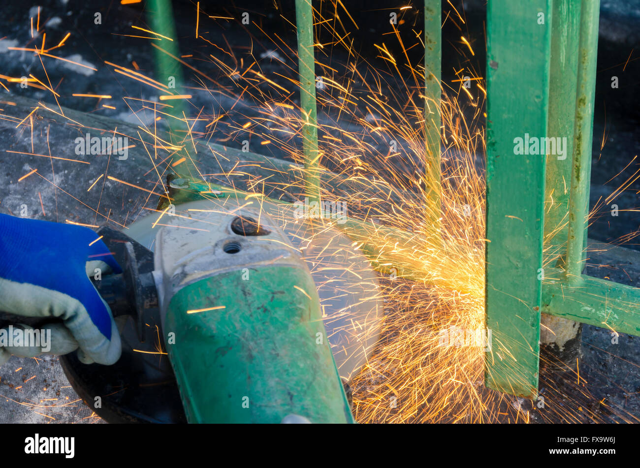 workers while cutting a metal railing Stock Photo - Alamy