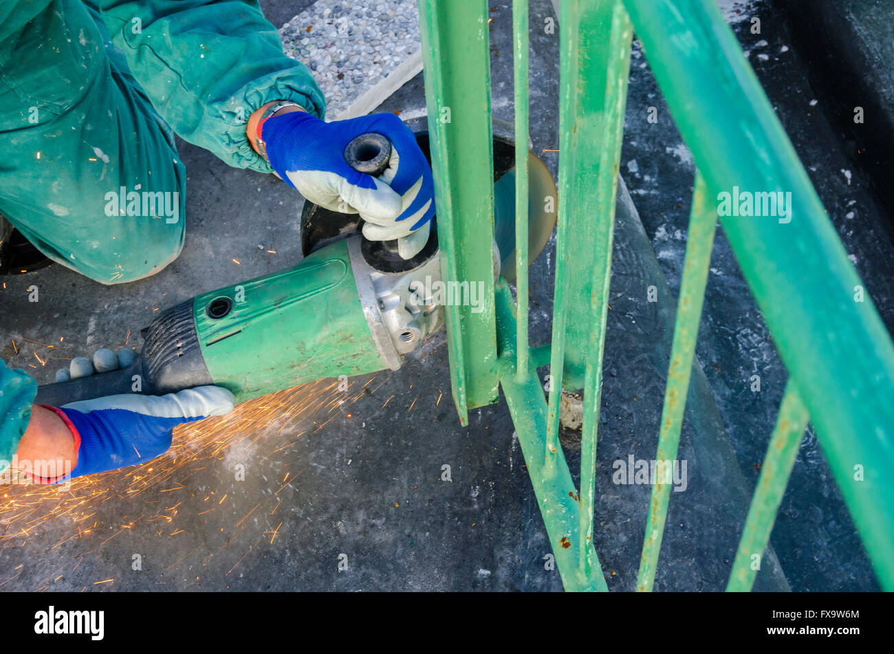 workers while cutting a metal railing Stock Photo - Alamy