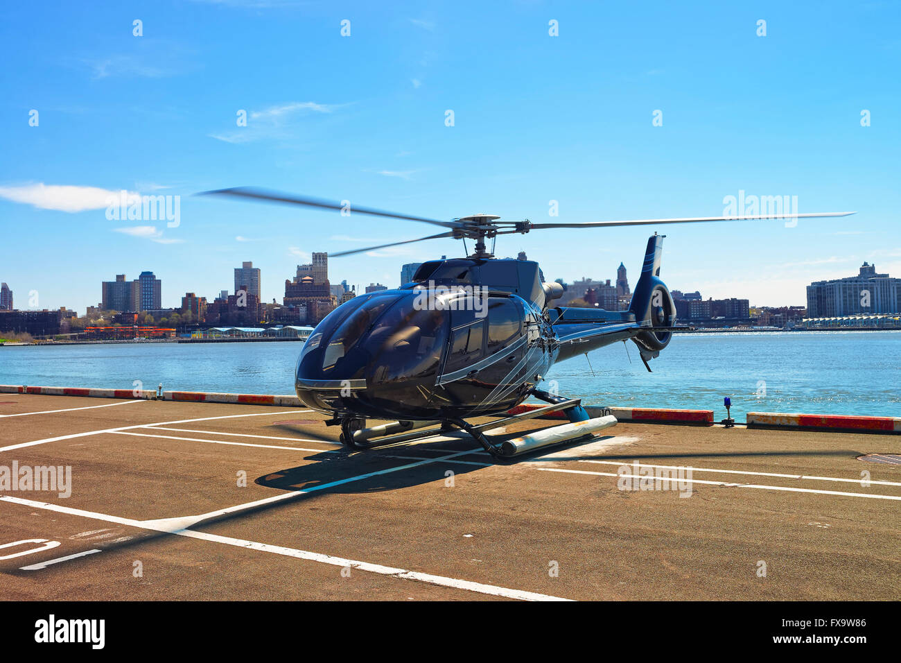 Black Helicopter on the helipad in Lower Manhattan in New York, USA, on ...