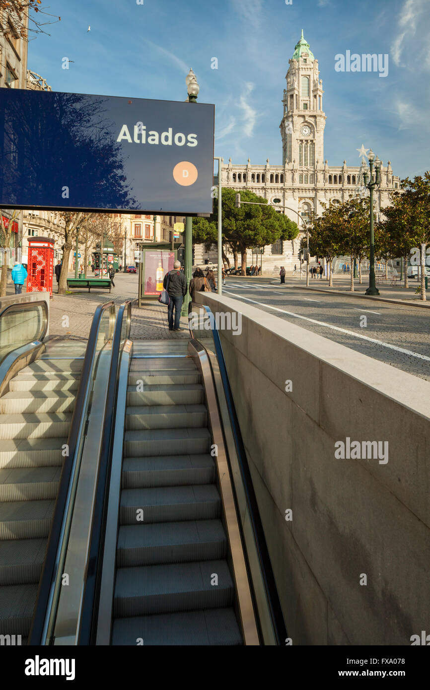 Entrance to Aliados metro station in Porto, Portugal. City Hall in the ...