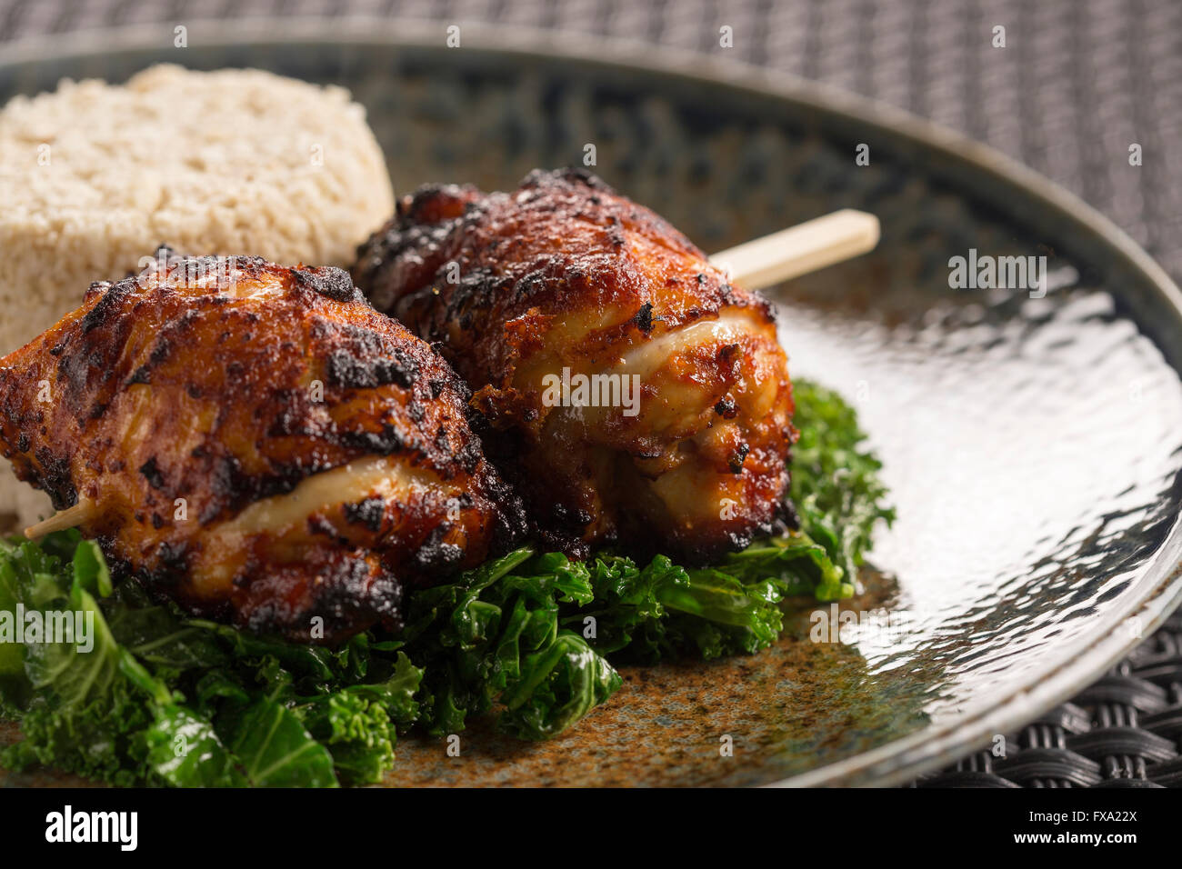 Korean BBQ Bulgogi Chicken with cauliflower rice & greens Stock Photo ...