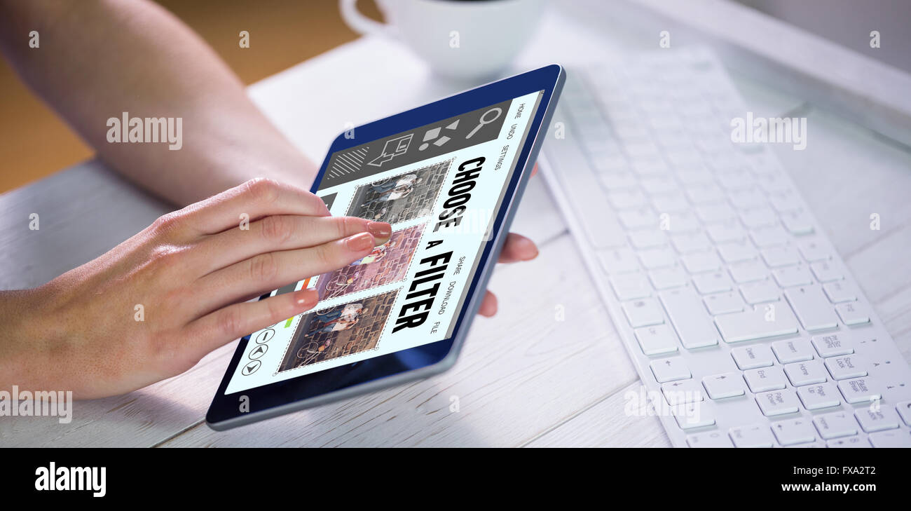 Woman scrolling smartphone desk hi-res stock photography and images - Alamy