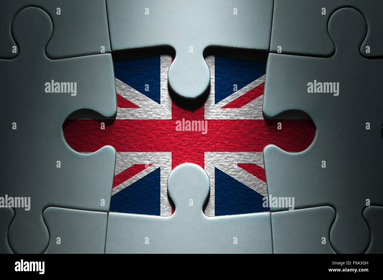 Missing piece from a jigsaw puzzle revealing the British flag Stock ...