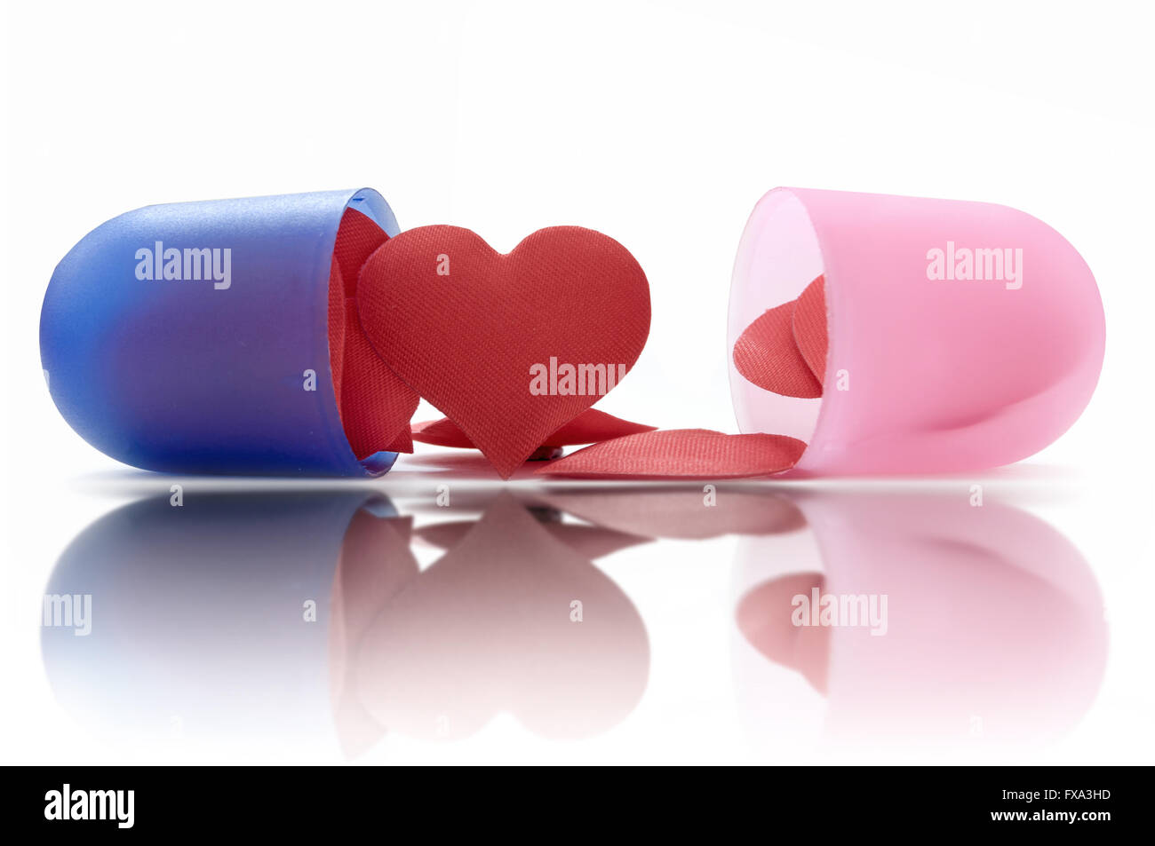 Heart shape pills inside a medicine pill capsule Stock Photo - Alamy
