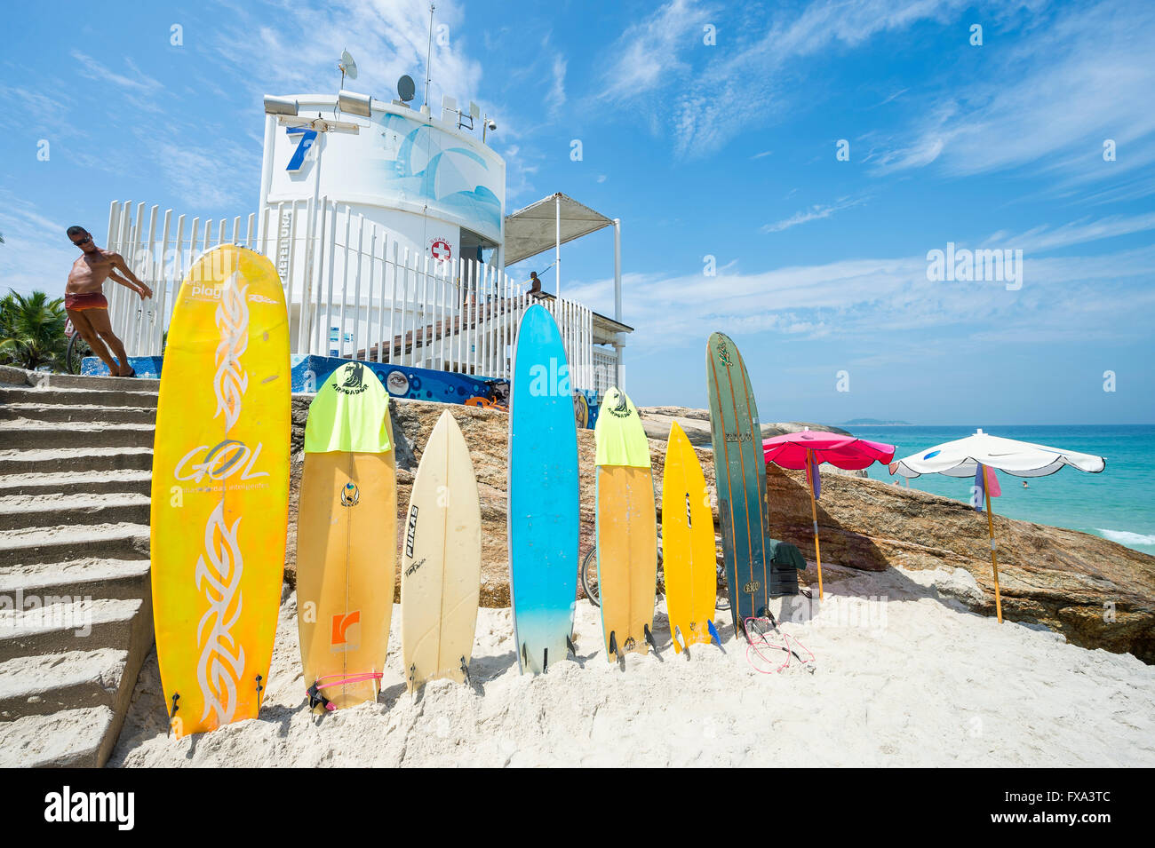 RIO DE JANEIRO - MARCH 30, 2016: A lifeguard stretches in front of ...