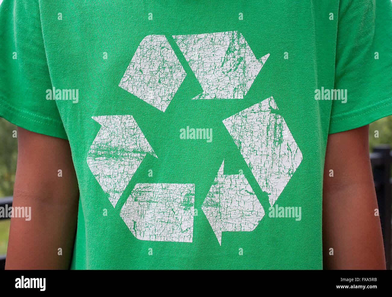 The recycle symbol on a green T-Shirt Stock Photo - Alamy