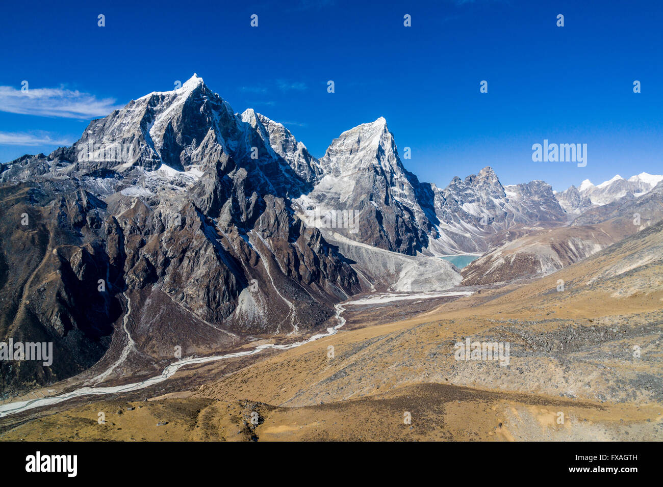 Aerial view of the mountains Cholatse (6335m) and Tabuche Peak (6367m ...