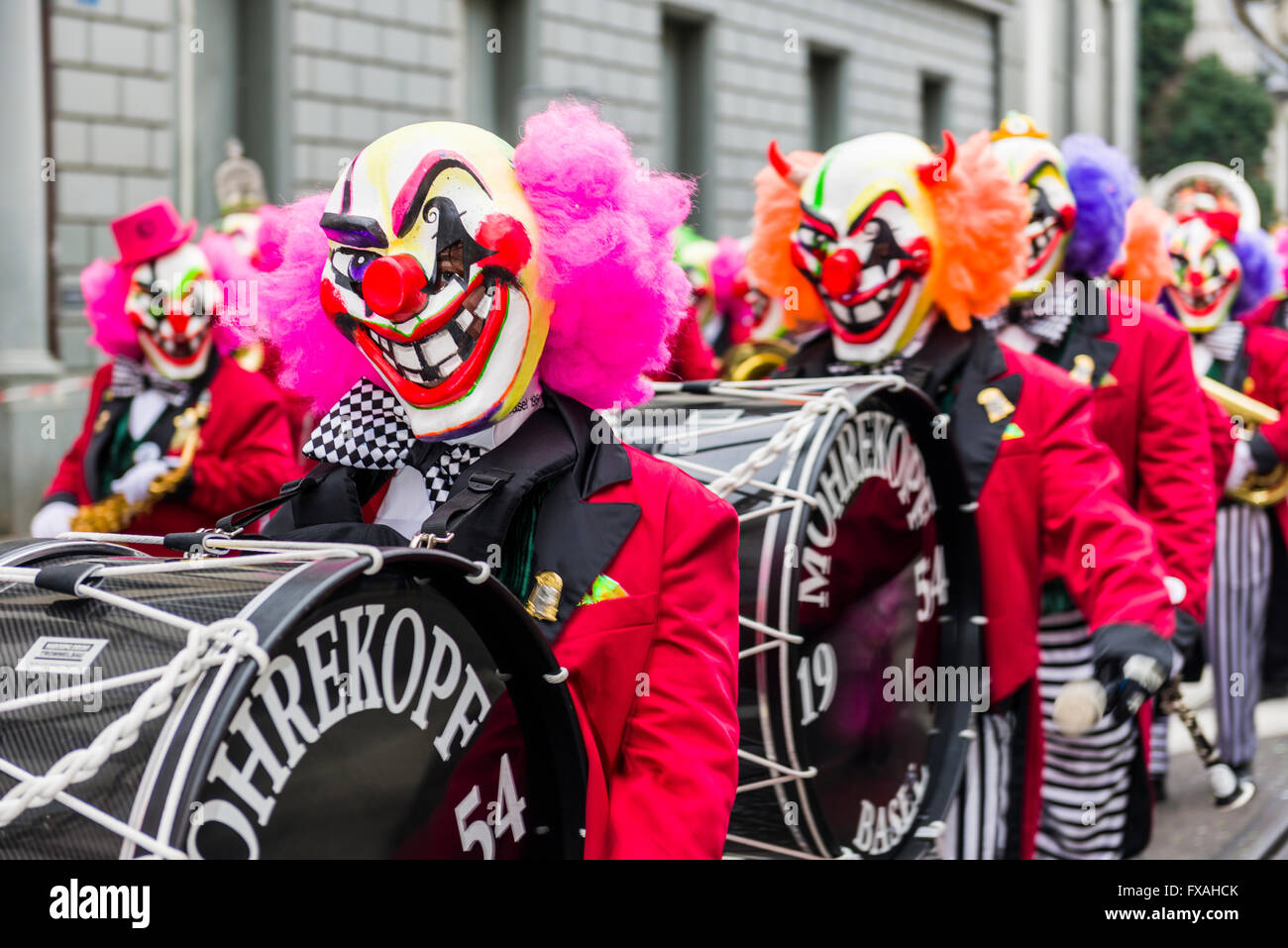 Members of the Gugge marching brass bands wearing fancy dresses and ...