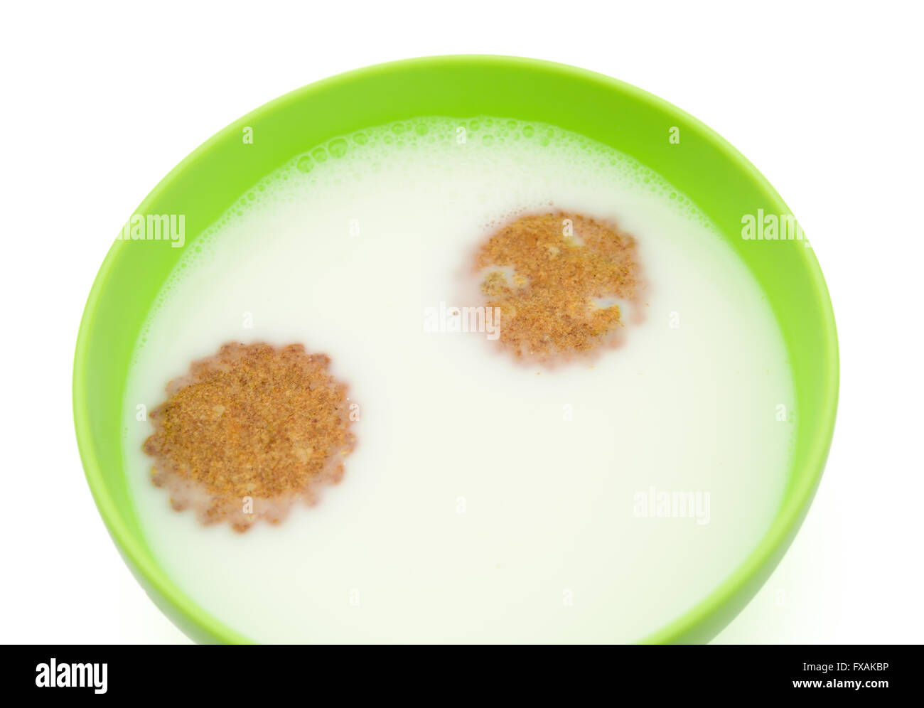 crackers floating on bowl of milk with copy space Stock Photo - Alamy