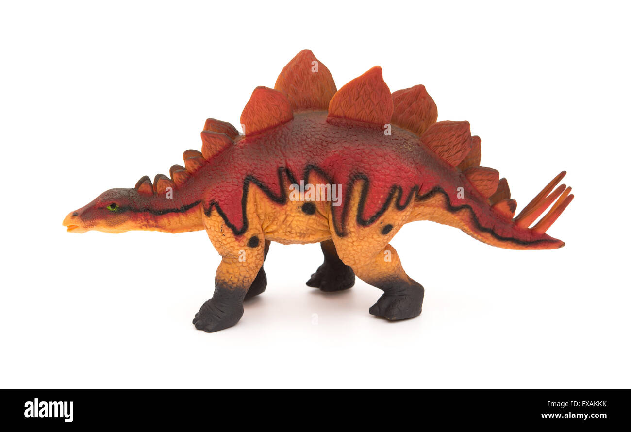 side view red stegosaurus toy on a white background Stock Photo - Alamy