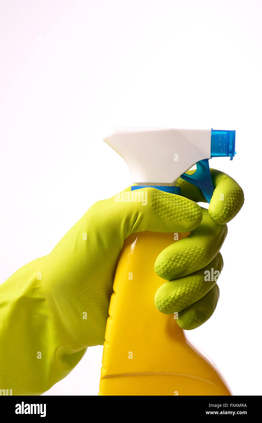 Hand with a cleaning spray bottle on a white background Stock Photo - Alamy