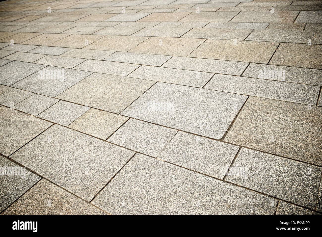 Floor of a street with stone tiles Stock Photo - Alamy