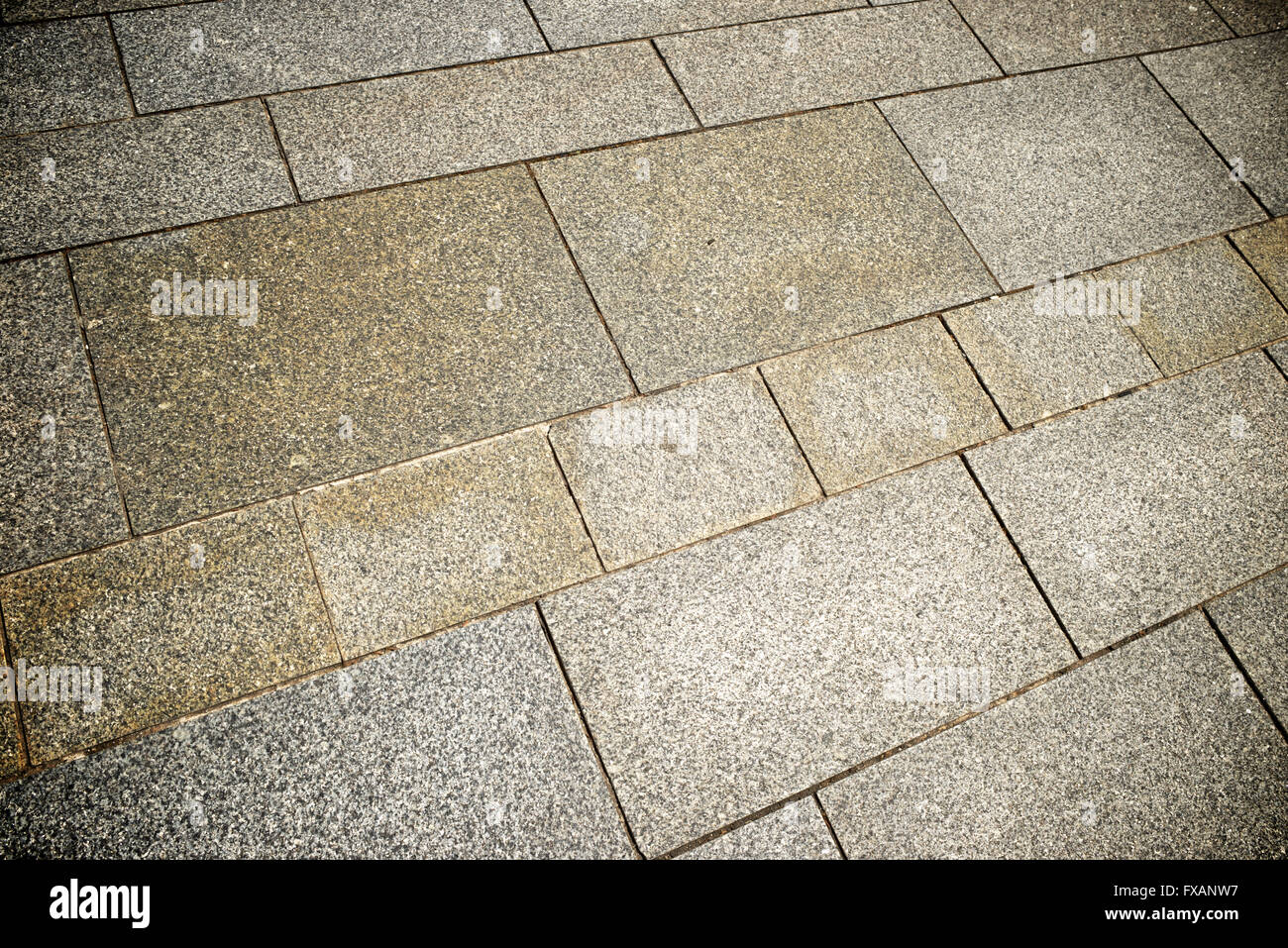 Floor of a street with stone tiles Stock Photo - Alamy