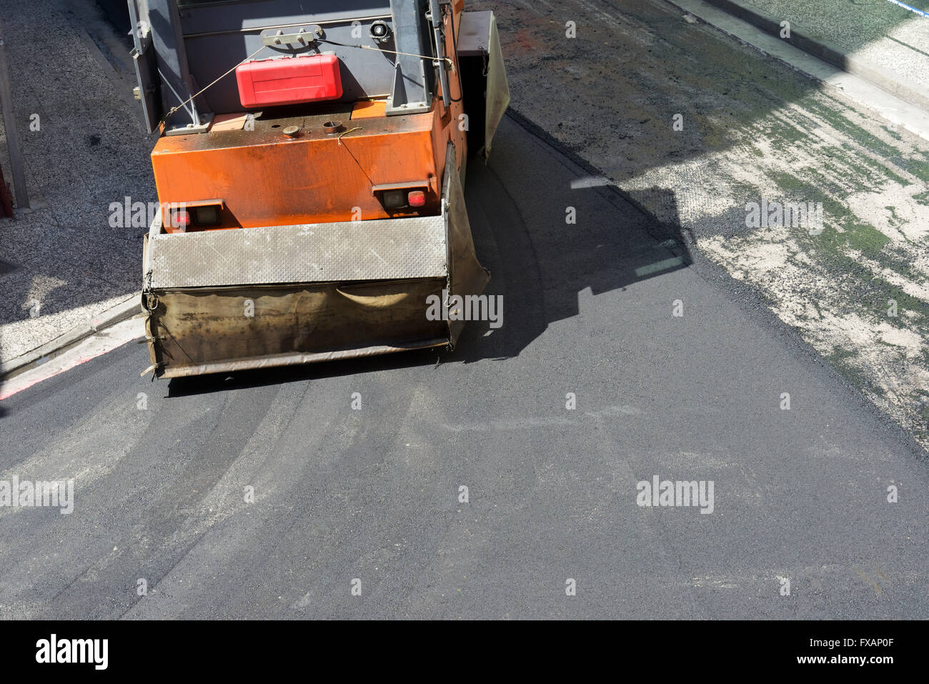 machine at asphalt pavement works for street repairing Stock Photo - Alamy