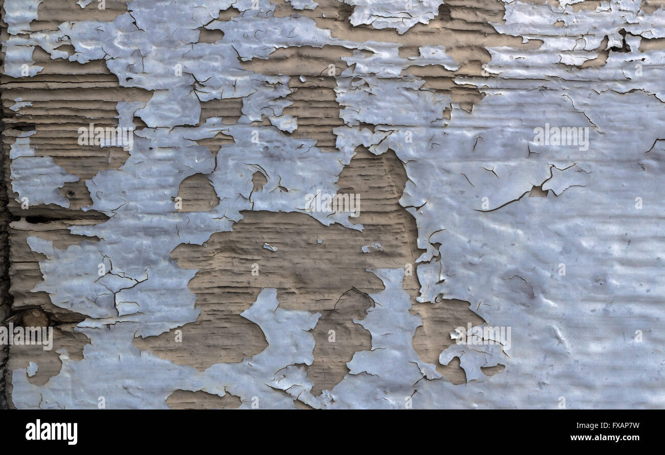 Peeling paint on weathered wood as a detailed background image Stock ...
