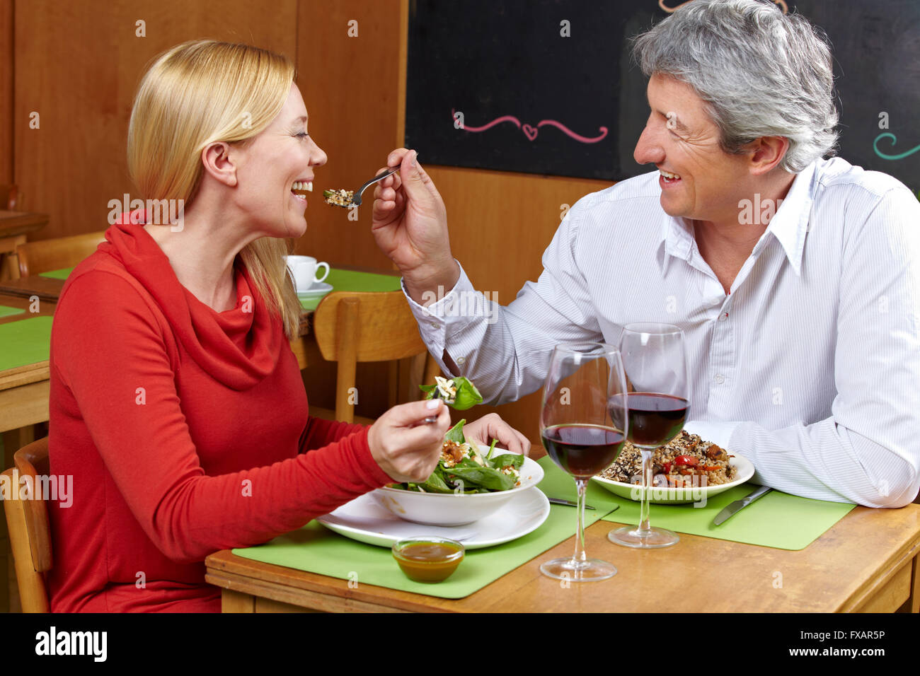 Happy old man eat bite hi-res stock photography and images - Alamy