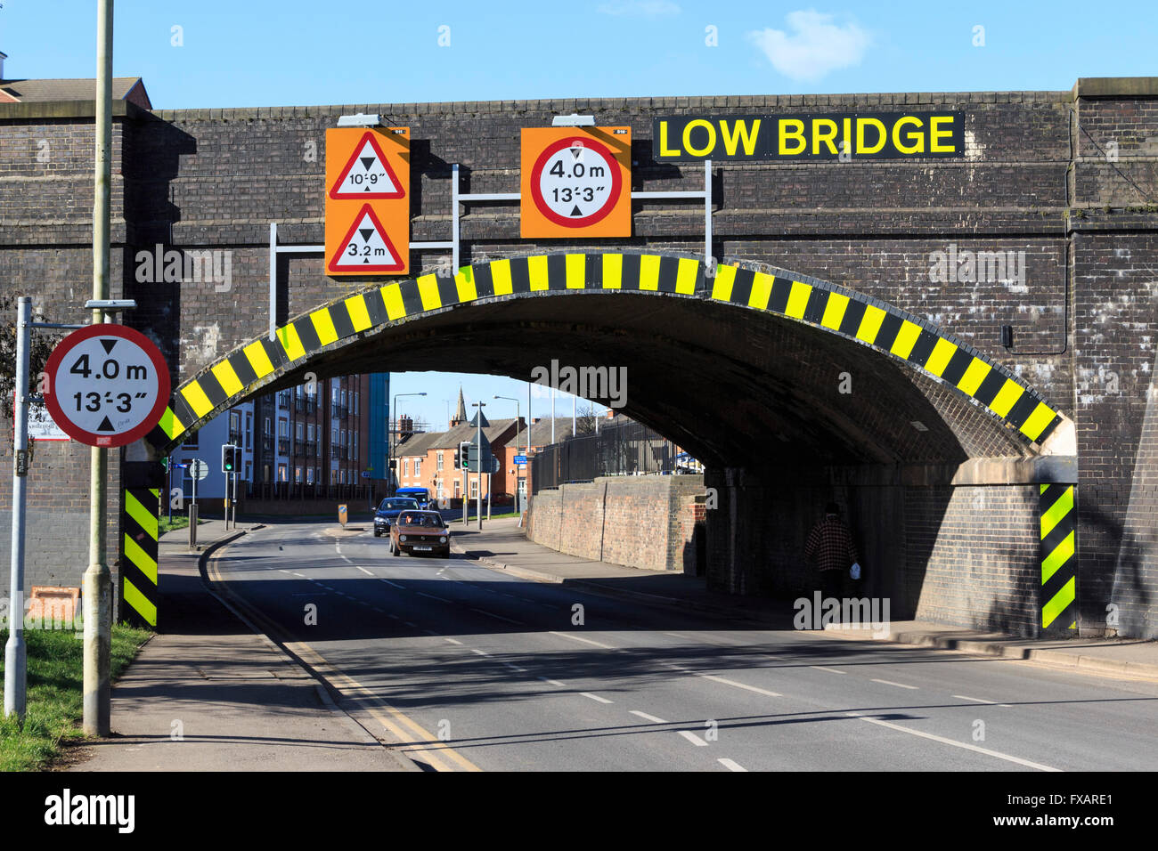 A signed low 4.0m headroom railway bridge in Market Harborough ...