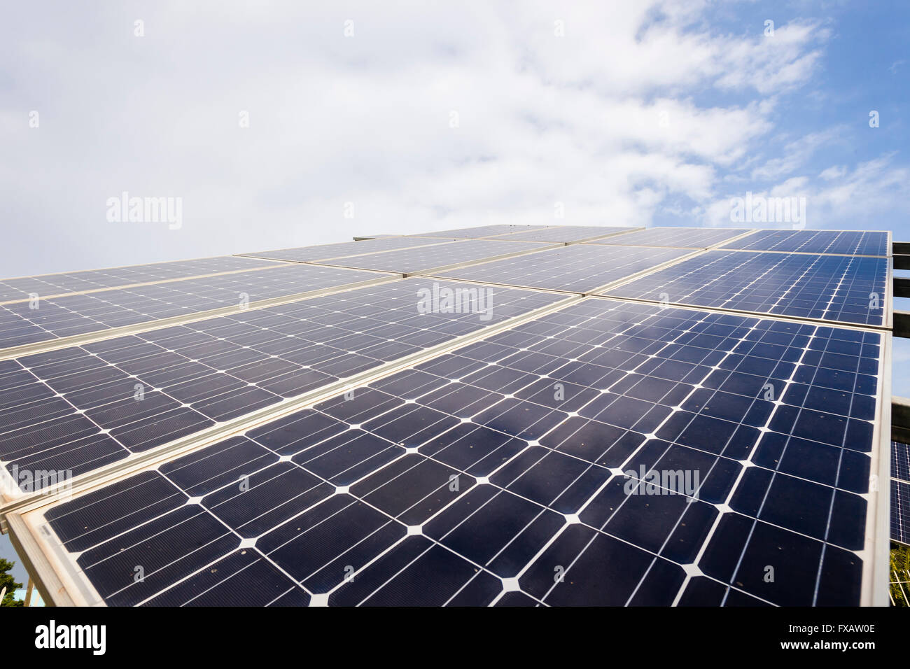 Solar screen panels creating clean electricity outdoors facing north ...