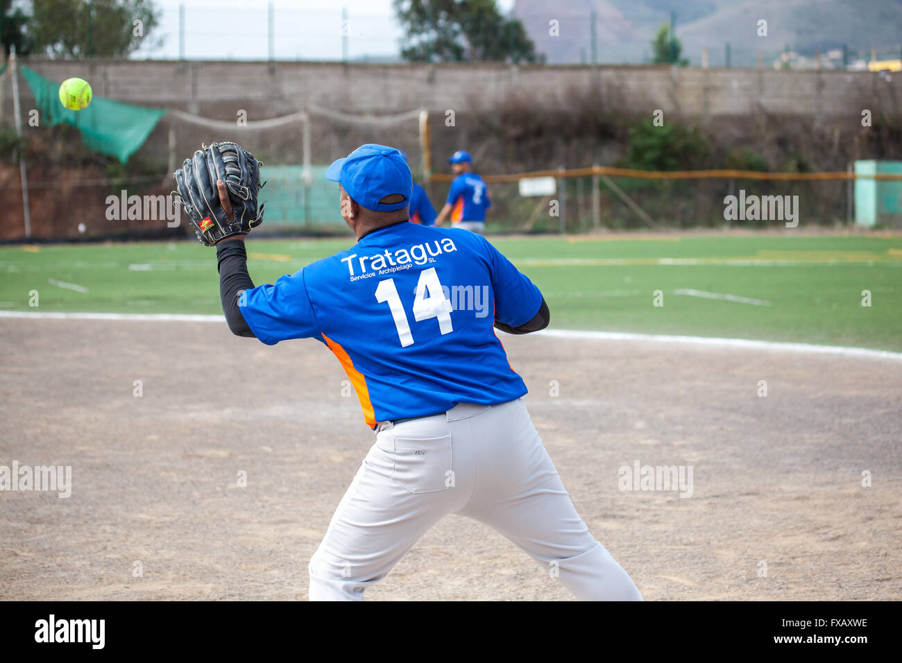 male versus male softball match Stock Photo - Alamy