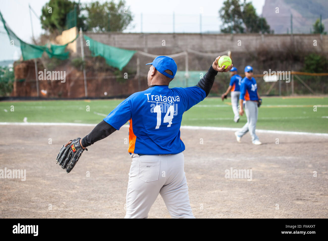 male versus male softball match Stock Photo - Alamy