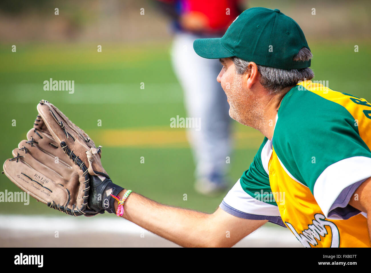 male versus male softball match Stock Photo - Alamy