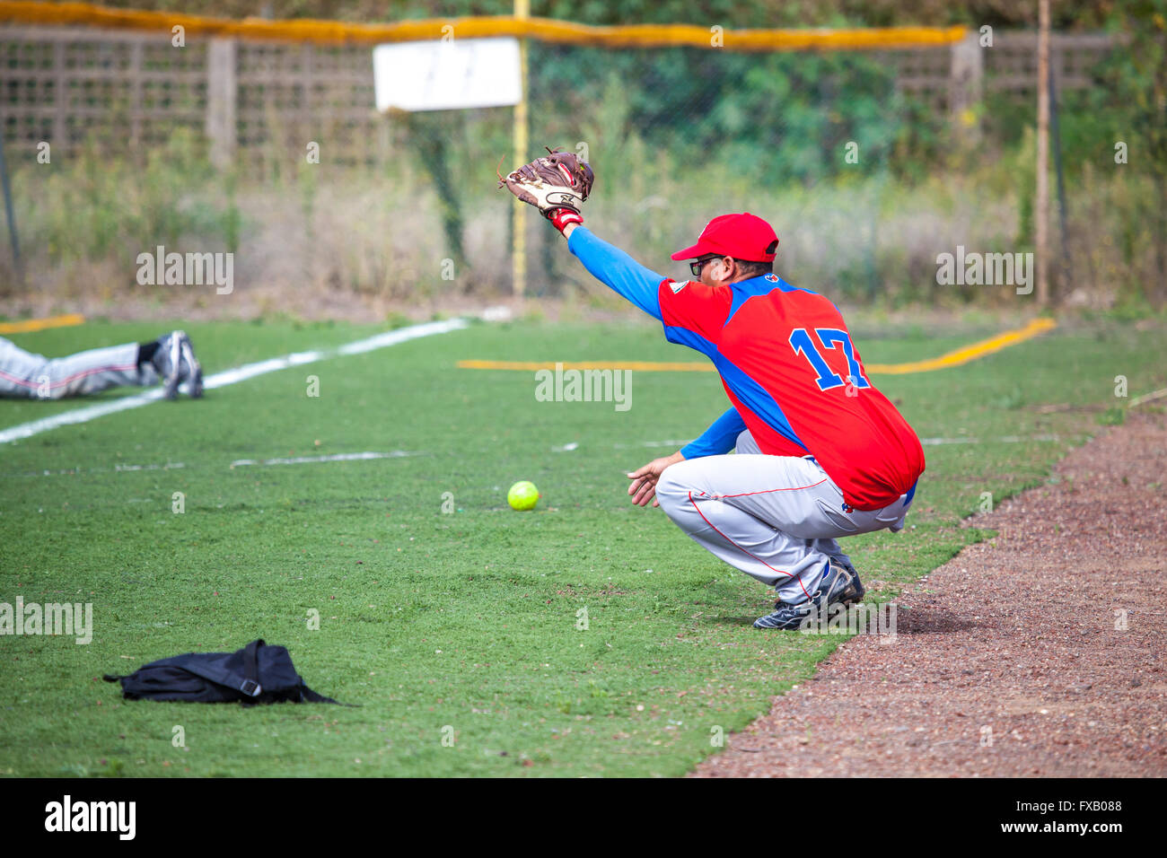 male versus male softball match Stock Photo - Alamy
