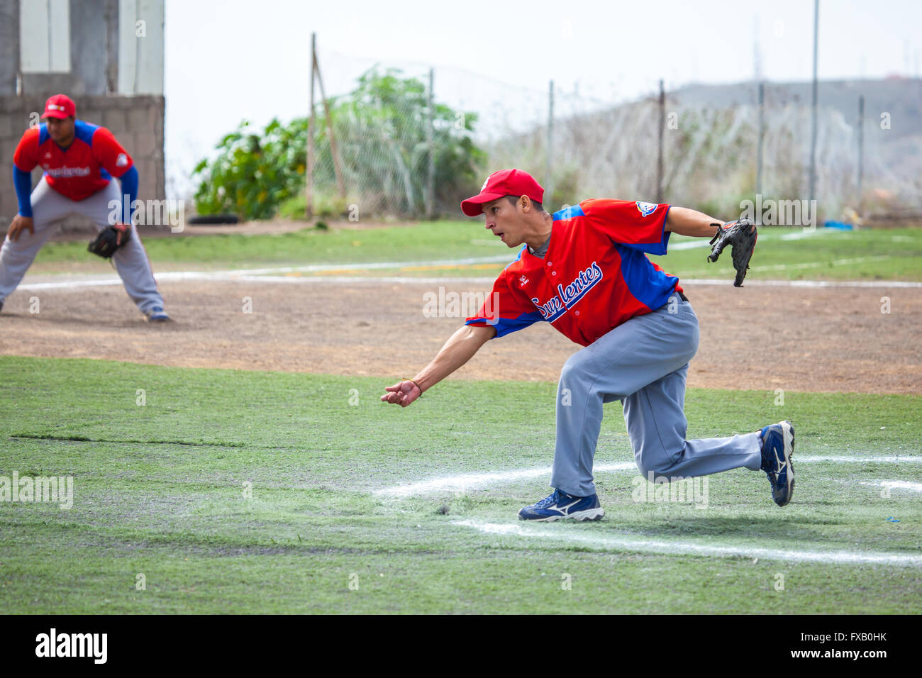 male versus male softball match Stock Photo - Alamy