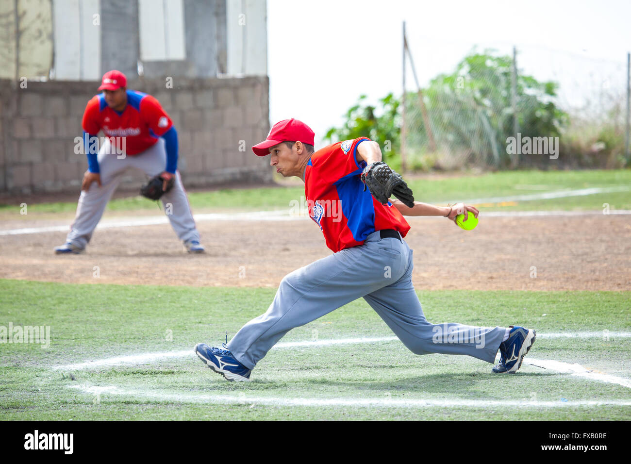 male versus male softball match Stock Photo - Alamy