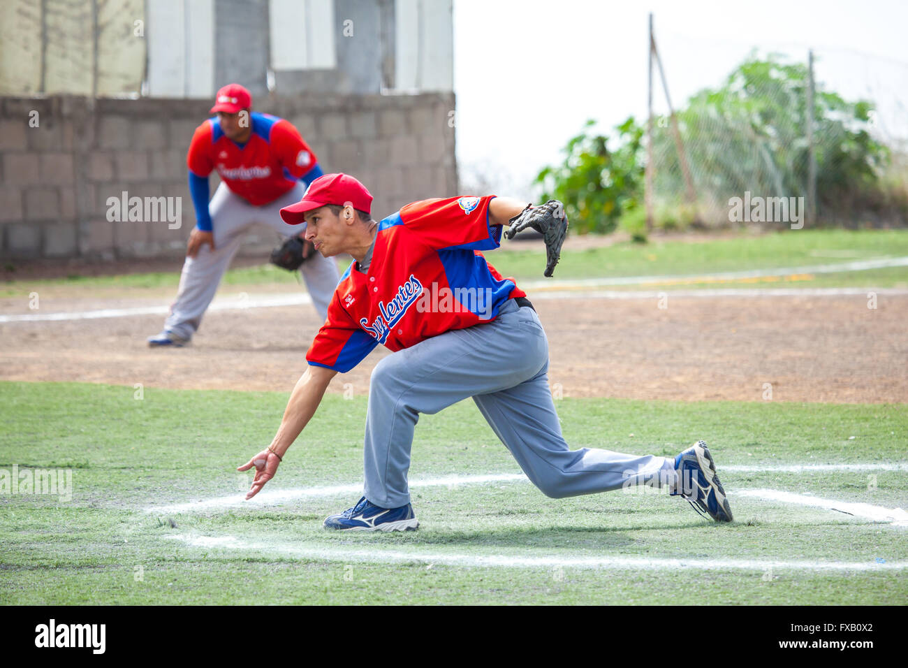 male versus male softball match Stock Photo - Alamy