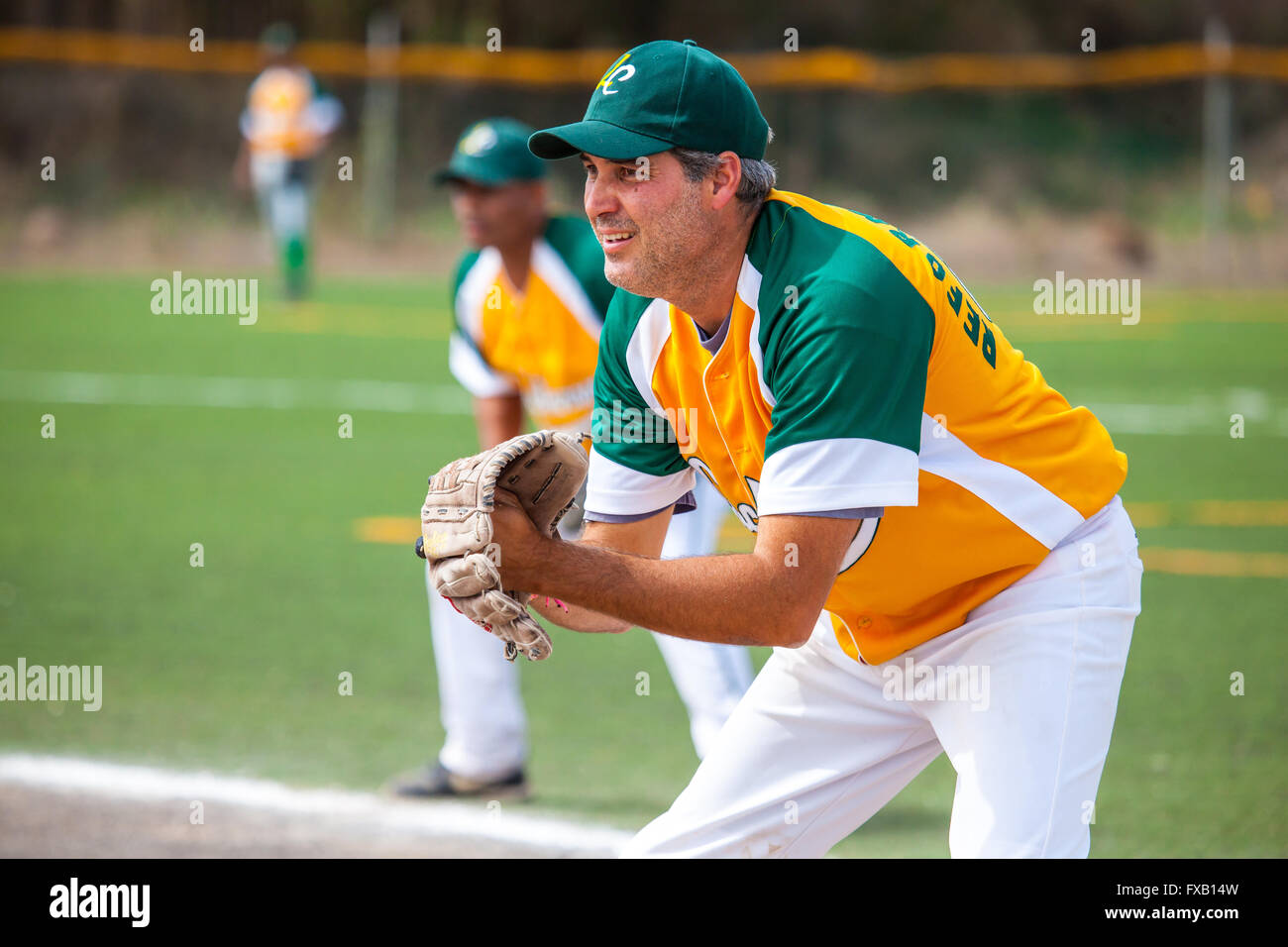 male versus male softball match Stock Photo - Alamy