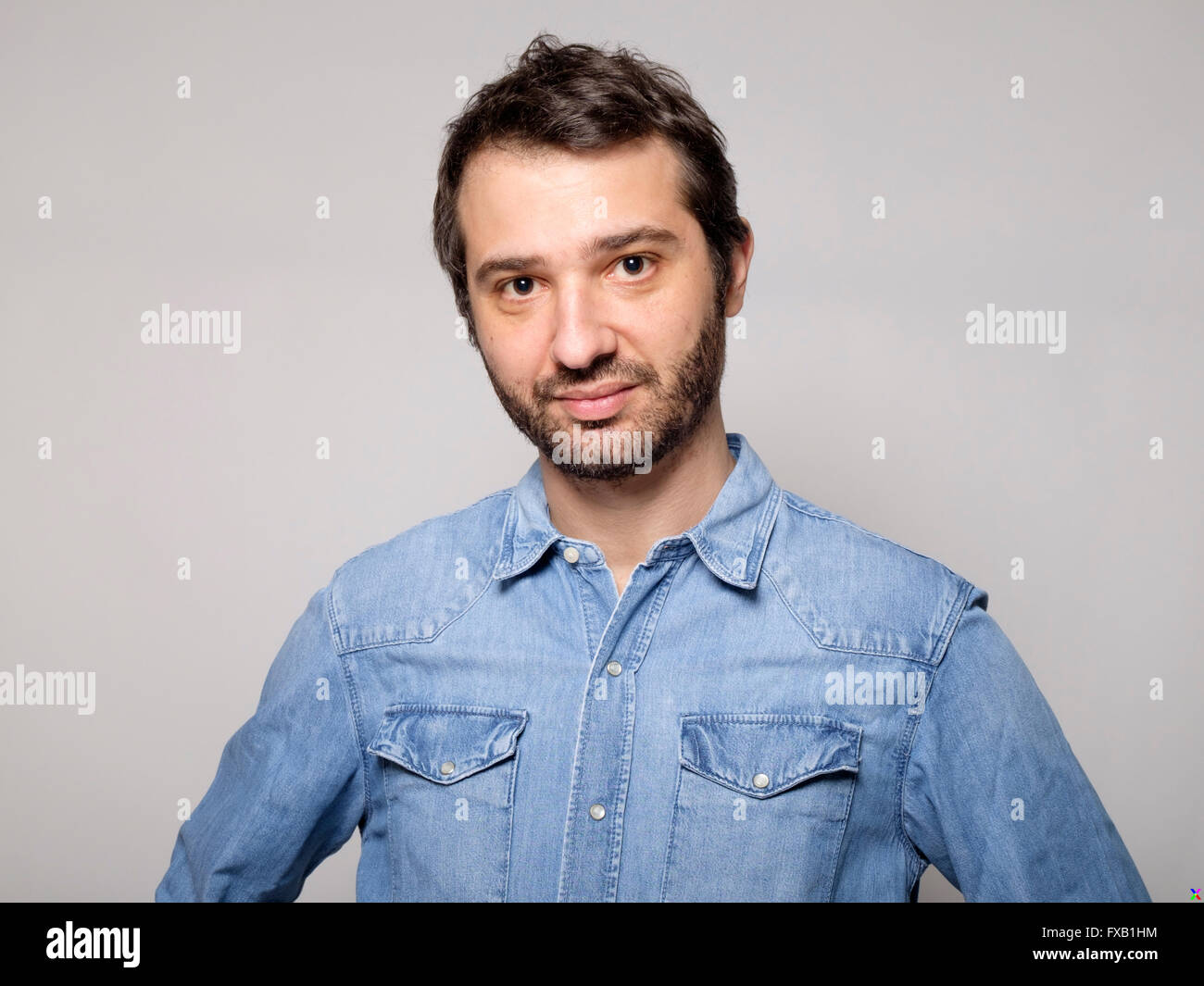 Portrait of white man on gray background Stock Photo - Alamy