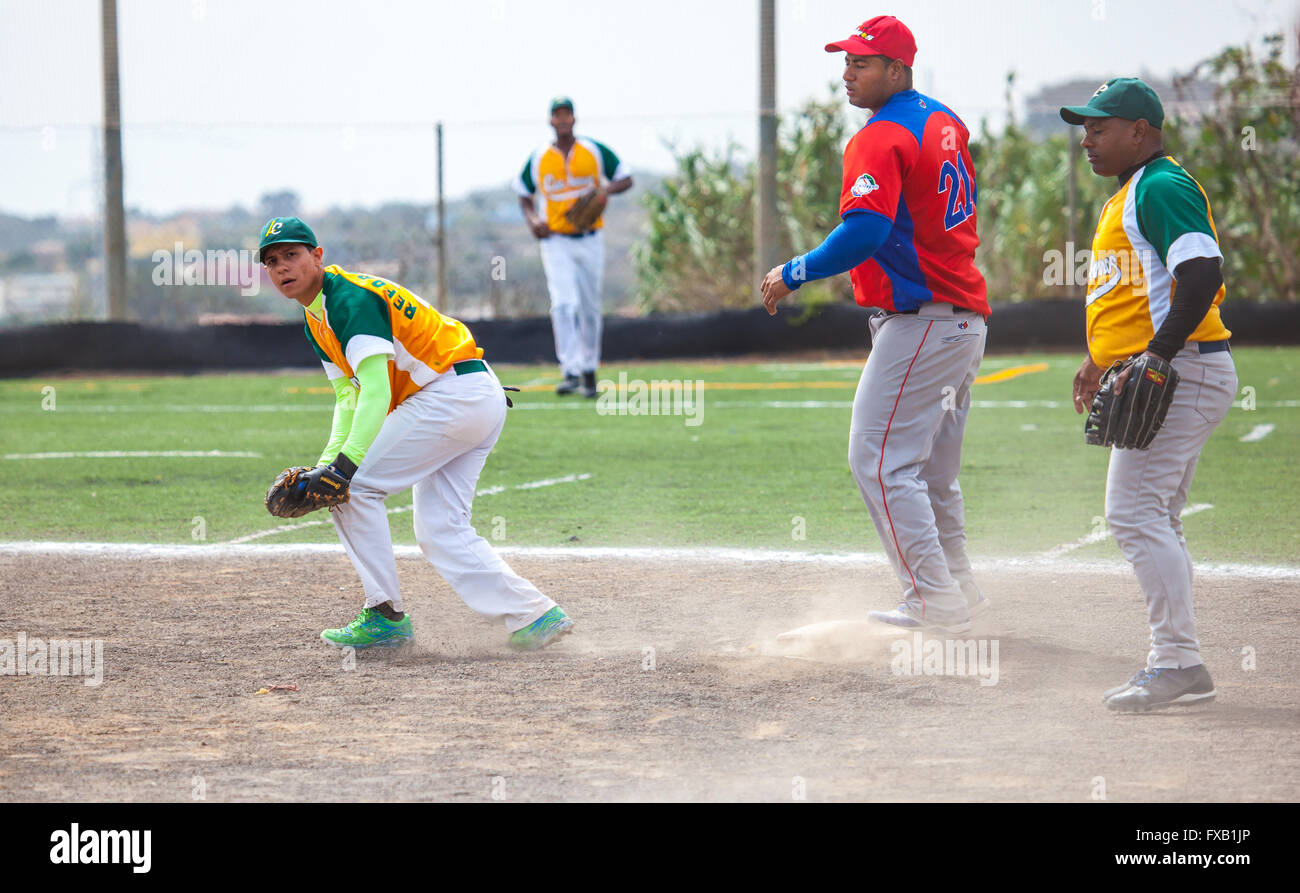 male versus male softball match Stock Photo - Alamy