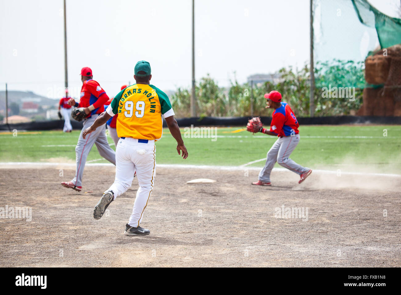 male versus male softball match Stock Photo - Alamy
