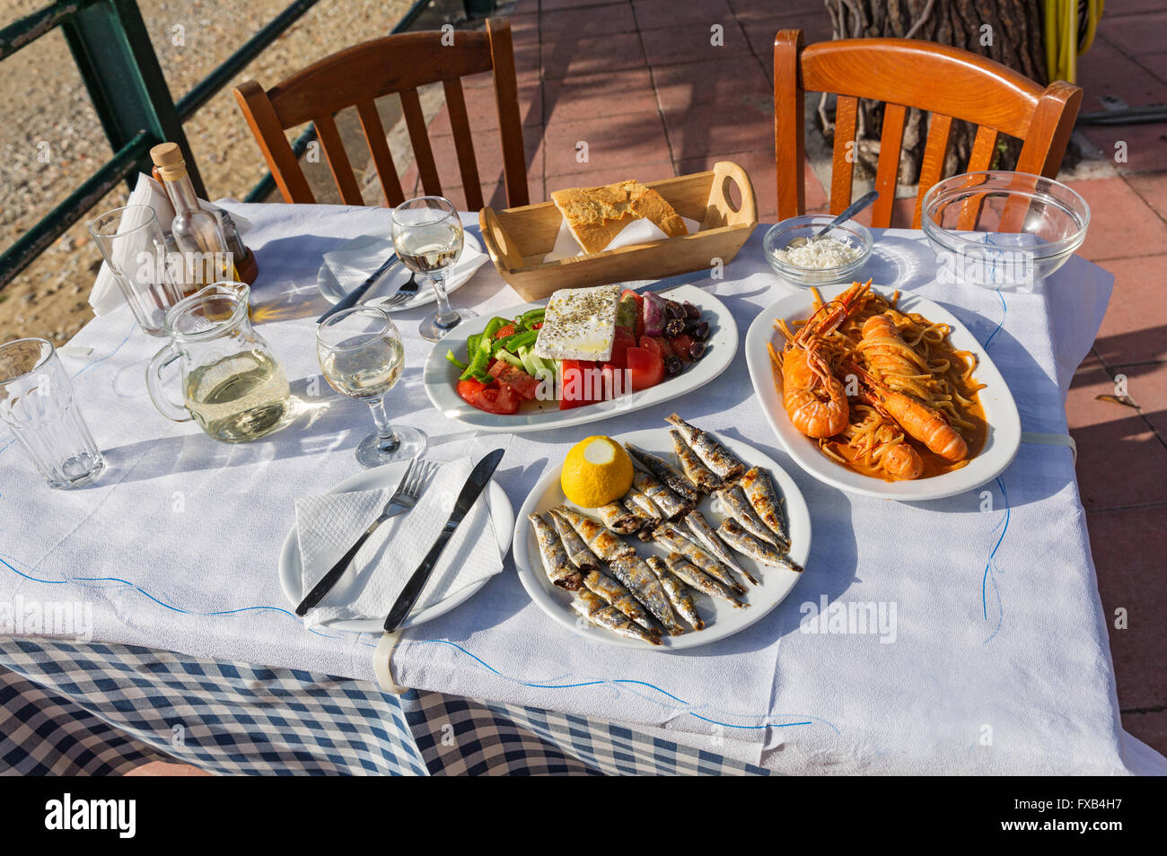 Table for dinner in a fish restaurant Stock Photo - Alamy