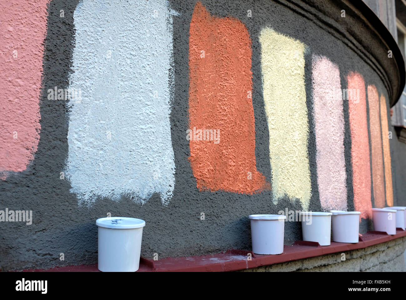 Paint samples on a facade of a historical building Stock Photo - Alamy