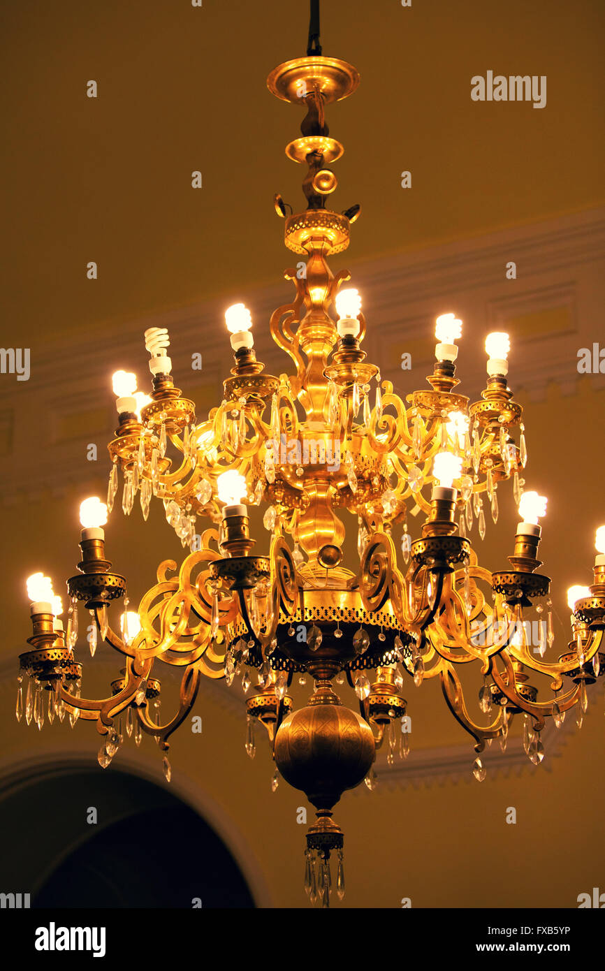 Beautiful gold Chandelier in church Stock Photo - Alamy
