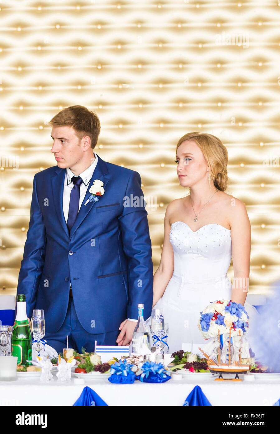 Emotional beautiful newlywed couple smiling at wedding reception Stock ...