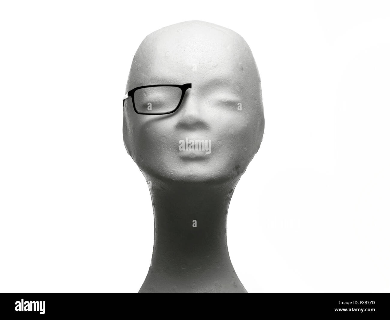 White dummy female head with half eyeglasses on white background Stock ...