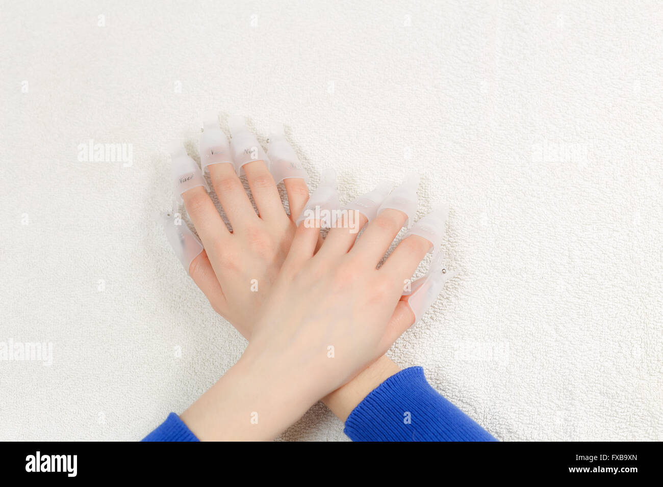Nail polish removing with special pin equipment Stock Photo - Alamy