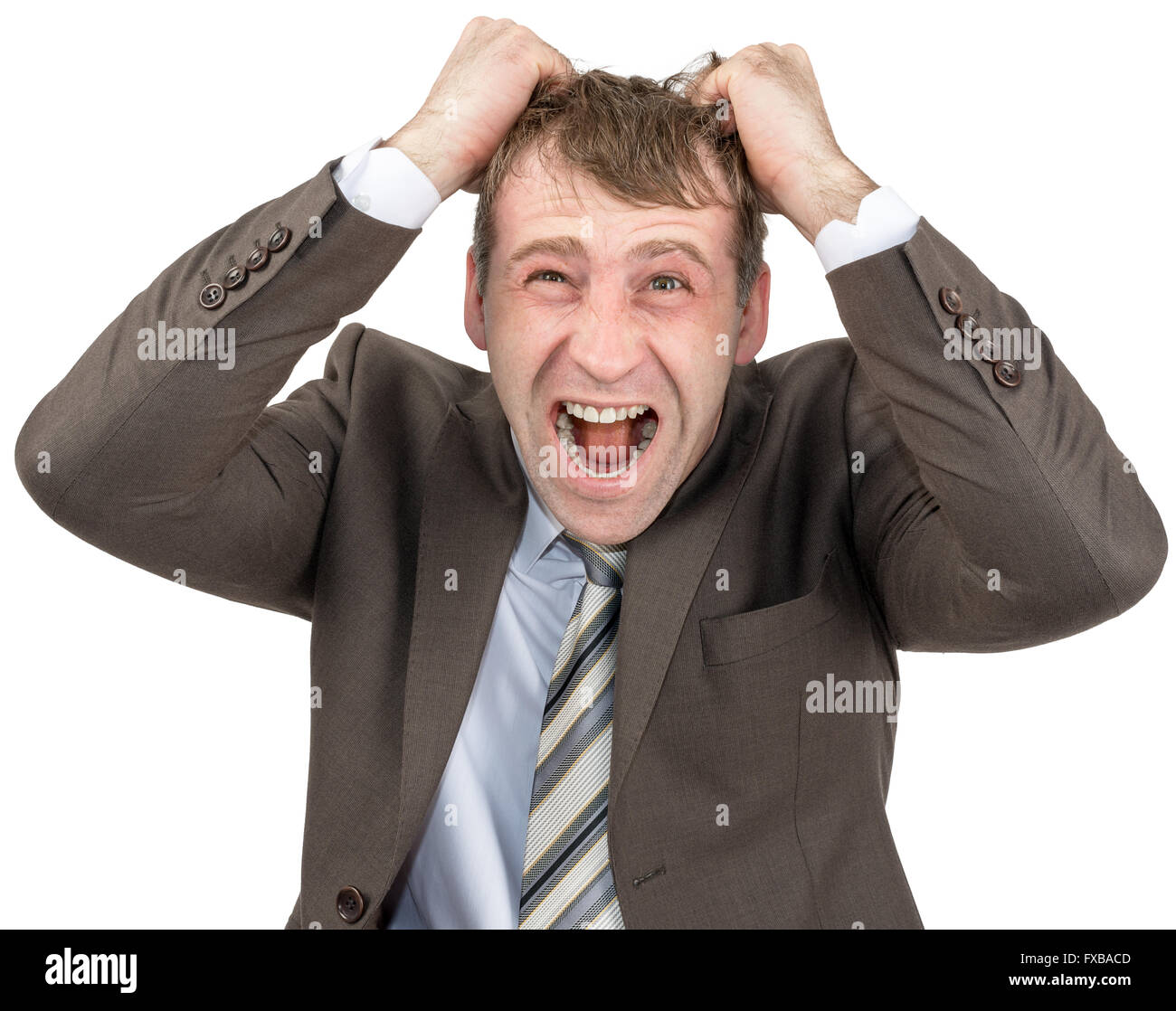 Screaming businessman tearing his hair Stock Photo - Alamy