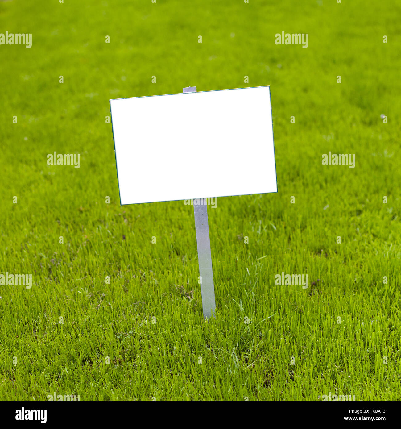 Sign on grass Stock Photo - Alamy
