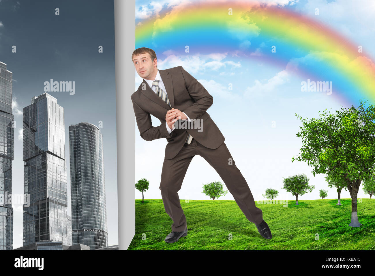 Businessman changing city on nature landscape Stock Photo - Alamy
