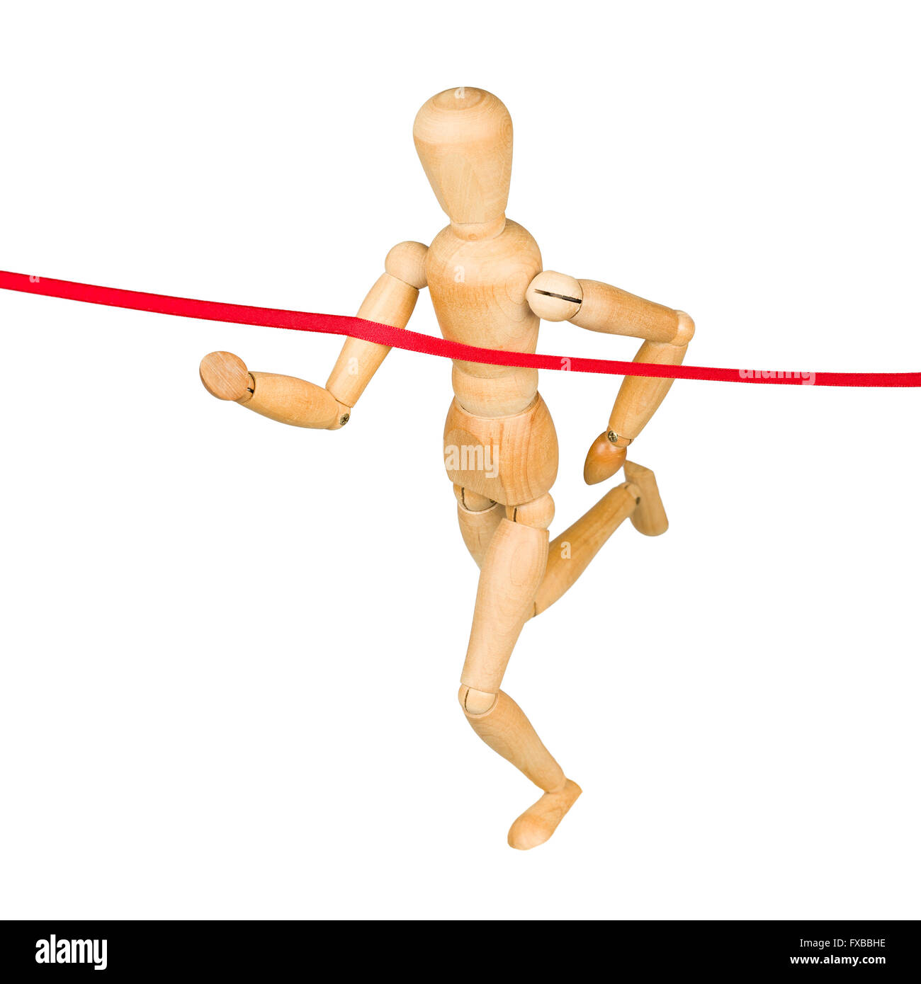 Wooden mannequin running through finishing line Stock Photo - Alamy