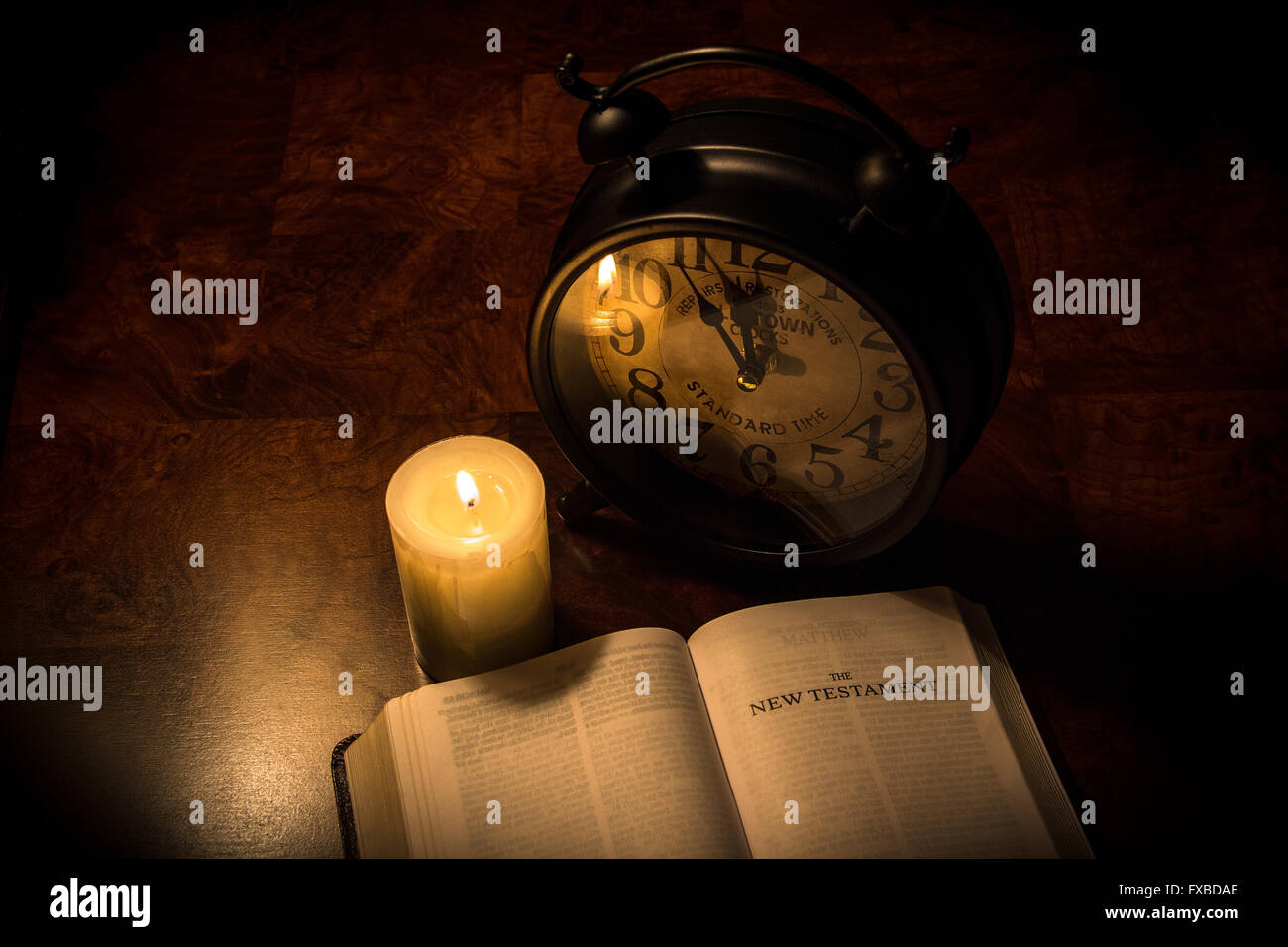 Bible candle clock hi-res stock photography and images - Alamy