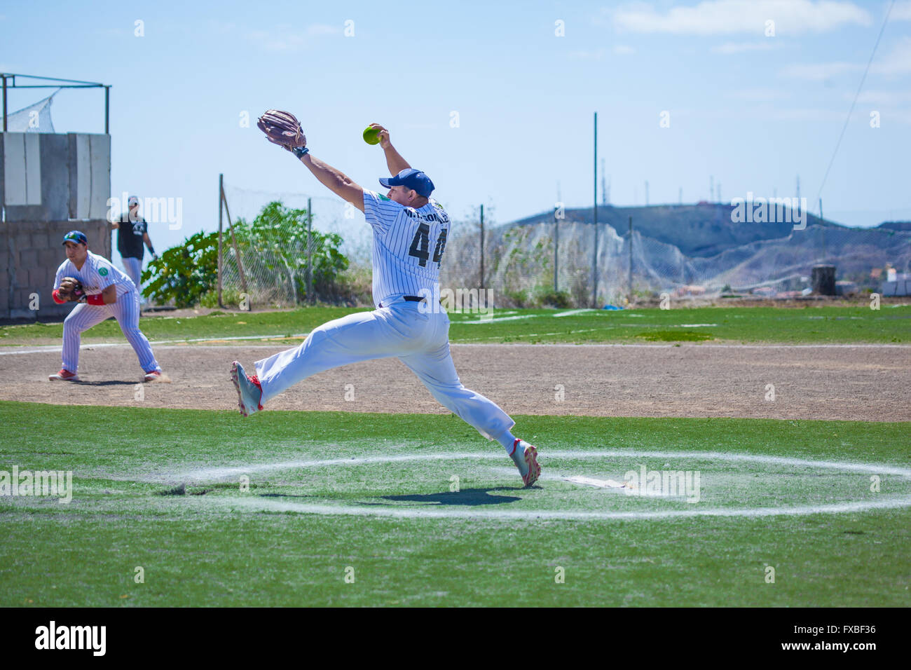 male versus male softball match Stock Photo - Alamy