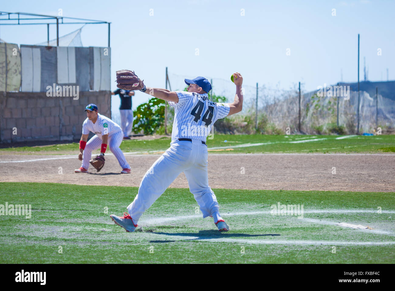 male versus male softball match Stock Photo - Alamy