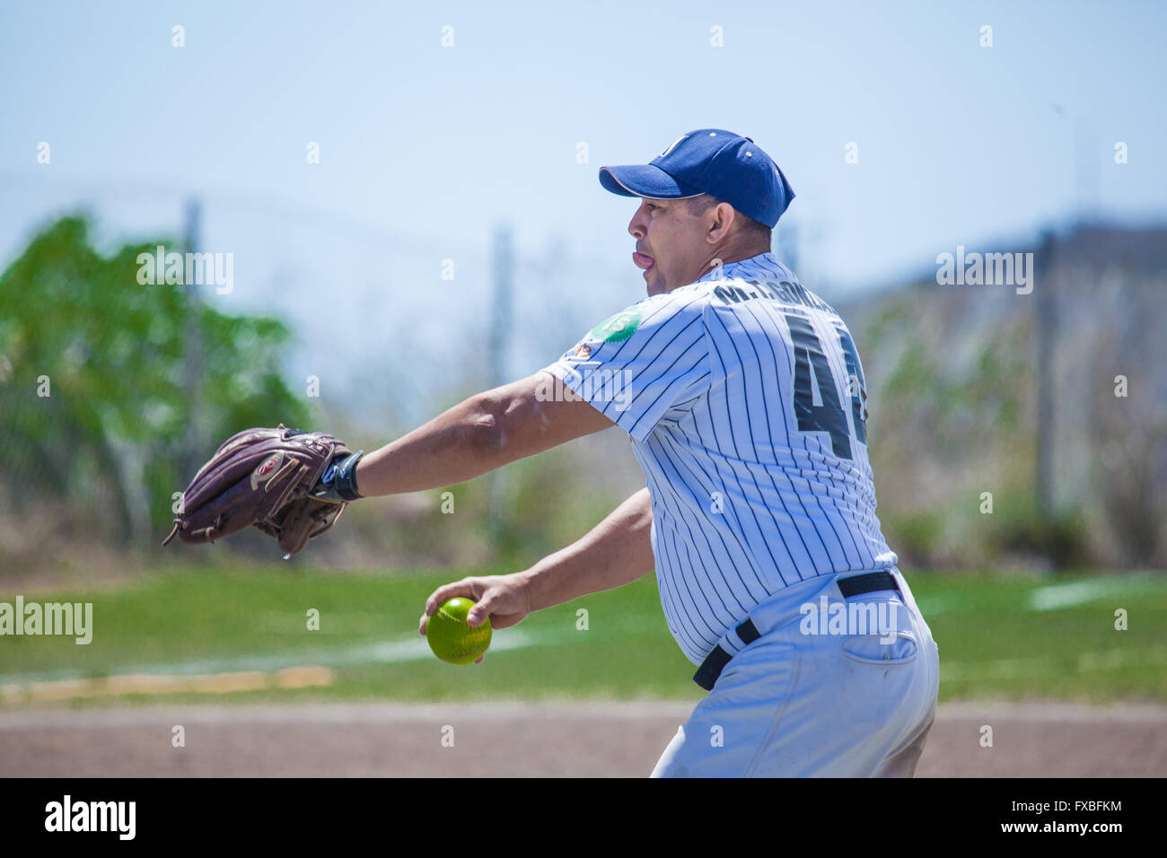 male versus male softball match Stock Photo - Alamy