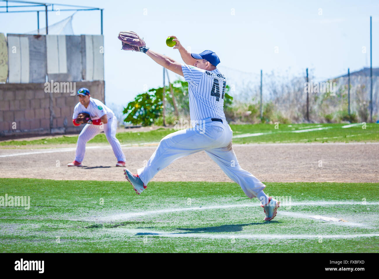 male versus male softball match Stock Photo - Alamy