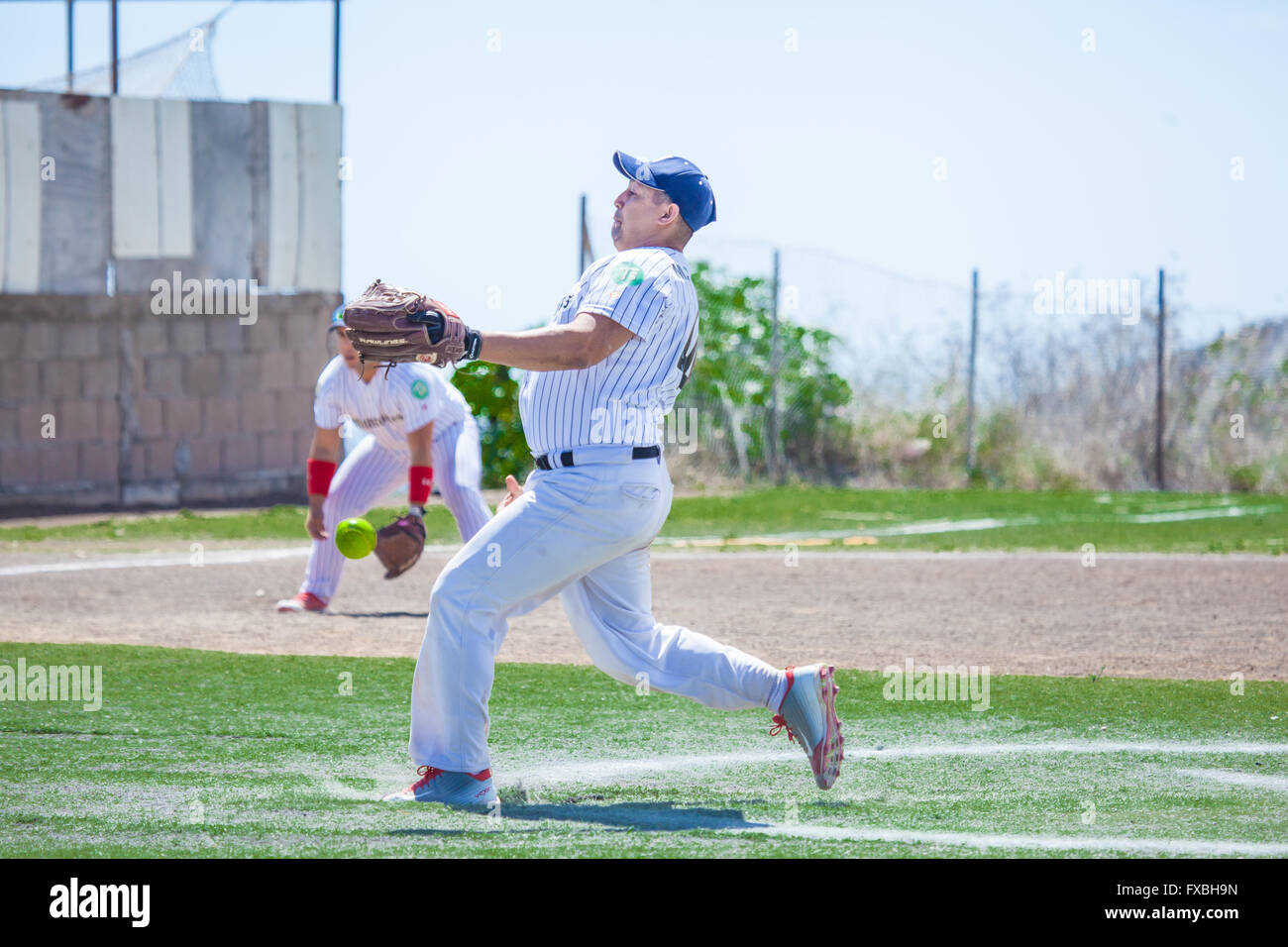 male versus male softball match Stock Photo - Alamy