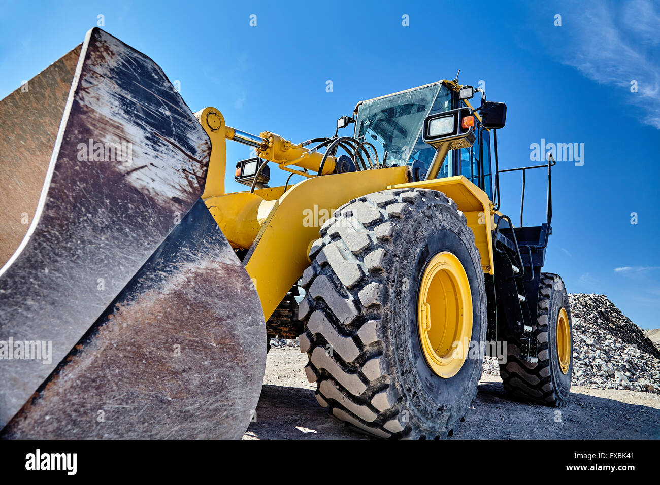 Construction heavy equipment loader and bucket on jobsite Stock Photo ...